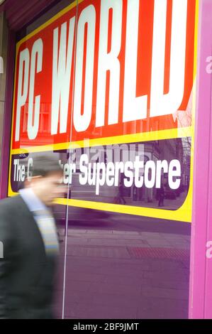 A man walks past a PC World computer store Stock Photo - Alamy