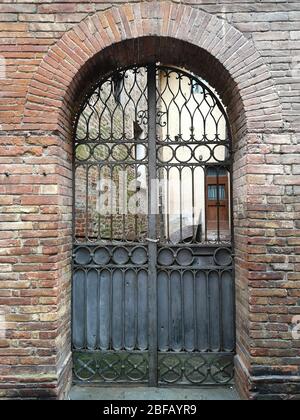Ancient iron gate of an ancient Italian villa Stock Photo - Alamy