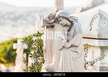 Crying angel on a graveyard Stock Photo - Alamy