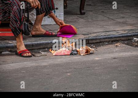 Burning money. Traditional Chinese New Year ritual of the burning of ...