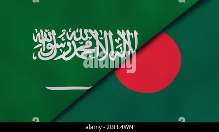 Bangladesh and Saudi Arabia flag waving in the wind against white ...