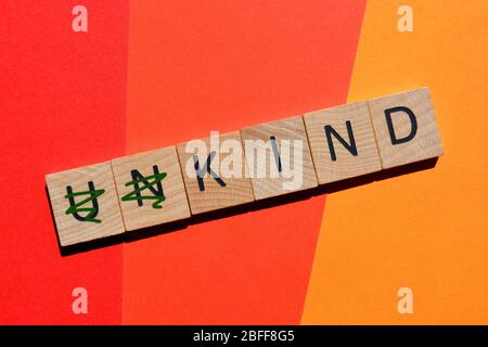 Unkind, word in 3d wood alphabet letters with un crossed out, leaving ...
