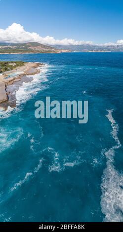 Panoramic aerial view of Ploce beach and storm waves on the Montenegrin ...