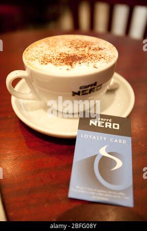 Caffe Nero coffee shop loyalty card and money, UK Stock Photo - Alamy