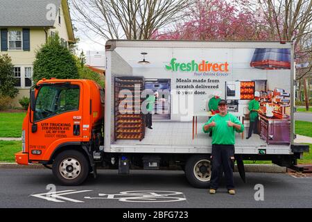 A Fresh Direct delivery truck parked during a food delivery in ...