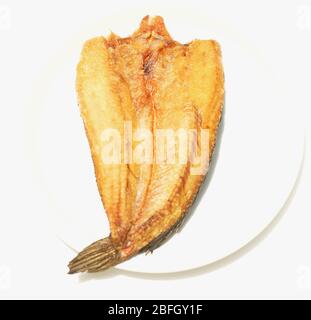 Fried fish on white background Stock Photo - Alamy