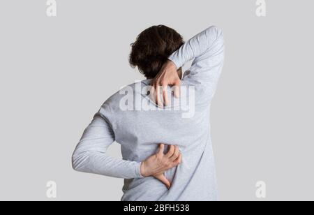 Itchy skin, allergy, skin problems concept. Young frustrated girl ...