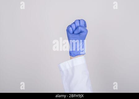 Photo of positive person fist up success subscribe hold gadget plaid ...