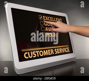 Hand holding a notepad with assistance concept Stock Photo - Alamy