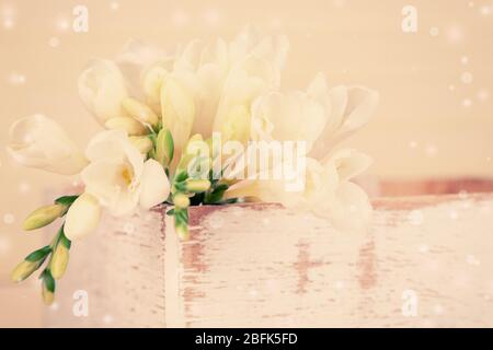 Beautiful freesias in wooden box Stock Photo - Alamy