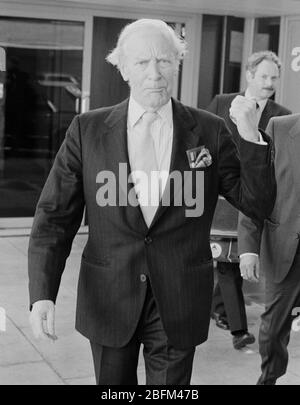 Sir Michael Havers leaving London's Heathrow Airport in May 1987 Stock ...