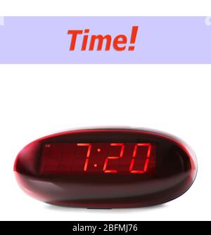 Digital clock showing 7:20 o'clock isolated on white Stock Photo - Alamy