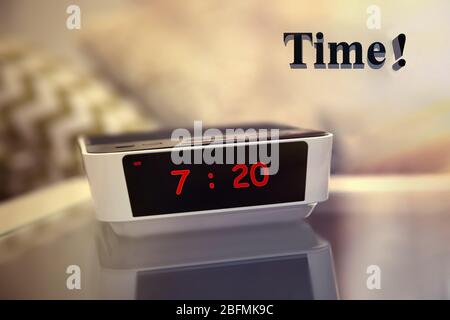 Digital clock showing 7:20 o'clock isolated on white Stock Photo - Alamy