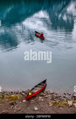 Spirit Island with red kayak by Maligne Lake, Jasper national park ...