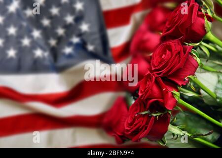 Roses on USA flag background. Symbol of America Stock Photo - Alamy