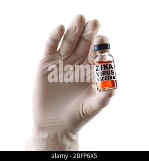 Zika virus danger concept. Hand in glove working with tablet, closeup ...