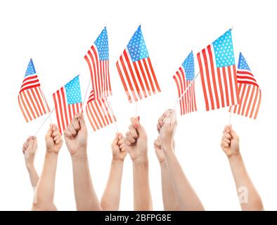Hands waving American flags on white background. Patriotic concept ...