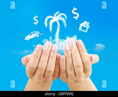 Female hands and clouds of different shapes on sky background Stock ...
