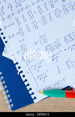 Math on copybook page closeup Stock Photo - Alamy