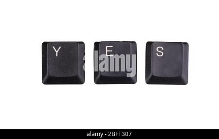 Keyboard keys saying yes isolated on white Stock Photo - Alamy