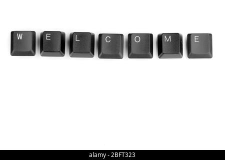 Keyboard keys saying welcome isolated on white Stock Photo - Alamy