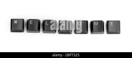 Keyboard keys saying welcome isolated on white Stock Photo - Alamy