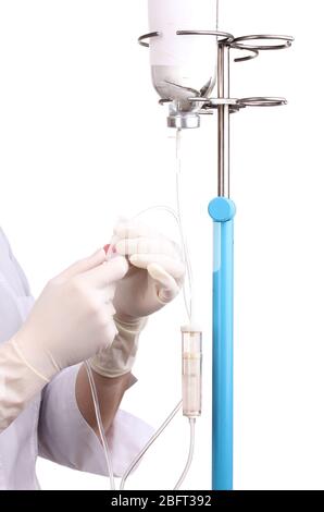Nurse doing infusion isolated on white Stock Photo - Alamy