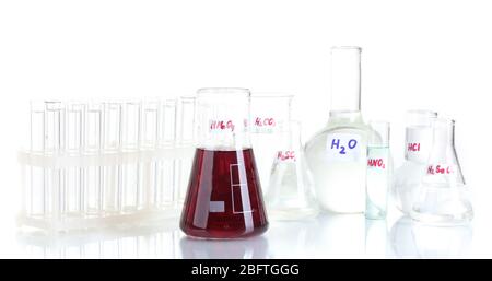 Test-tubes with various acids isolated on white Stock Photo - Alamy