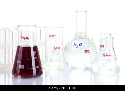 Test-tubes with various acids isolated on white Stock Photo - Alamy