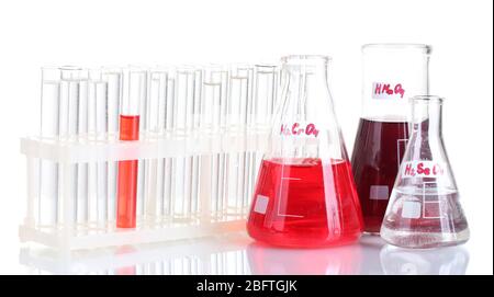 Test-tubes with various acids isolated on white Stock Photo - Alamy