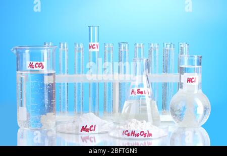 Test-tubes with various acids and chemicals isolated on white Stock ...