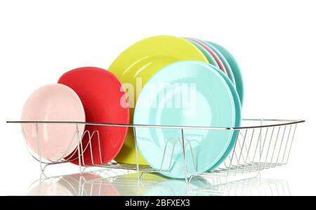 Color plates in rack isolated on white Stock Photo - Alamy