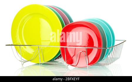 Color plates in rack isolated on white Stock Photo - Alamy