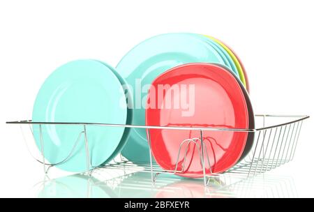 Color plates in rack isolated on white Stock Photo - Alamy