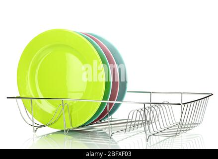 Color plates in rack isolated on white Stock Photo - Alamy