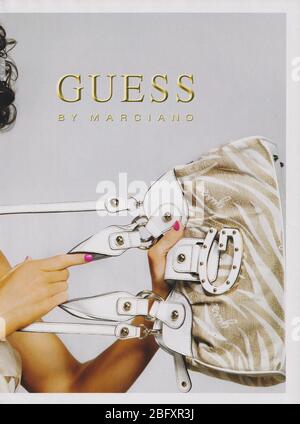 poster advertising GUESS with Line Gost female model in paper magazine ...