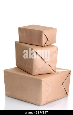 parcels boxes with kraft paper, isolated on white Stock Photo - Alamy