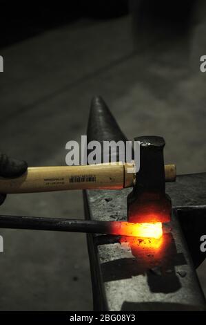 Forging iron on an anvil Stock Photo - Alamy