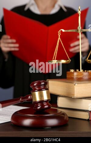 Judge read verdict on purple background Stock Photo - Alamy