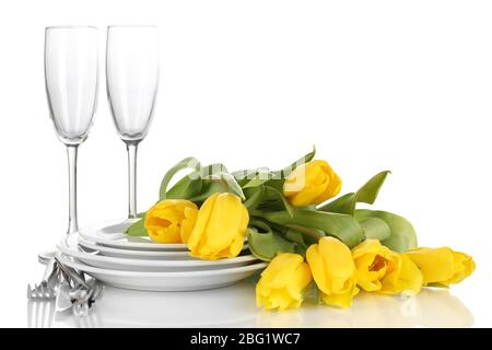 Yellow tulips and utensils for serving isolated on white Stock Photo ...