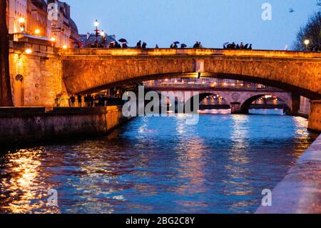 Petit Pont single arch bridge and Pont Saint-Michel over the Seine ...