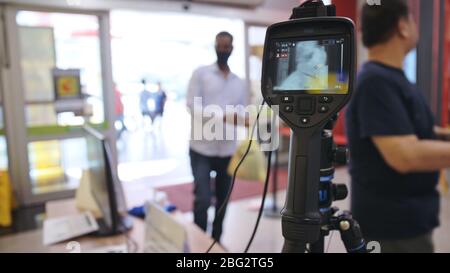 Temperature check at a supermarket, grocery store with thermal imaging ...
