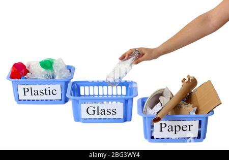 Three baskets of assorted debris isolated on white Stock Photo - Alamy
