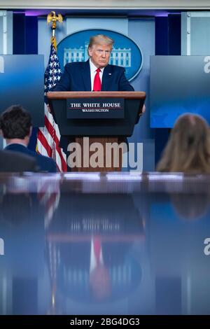 President Donald Trump listens to a question during a news conference ...
