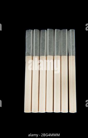 Empty cigarette tubes isolated Stock Photo - Alamy