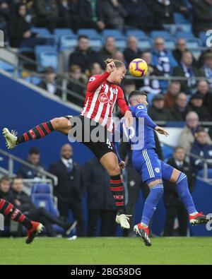 Jannik Vestergaard of Southampton contests a header with Callum ...