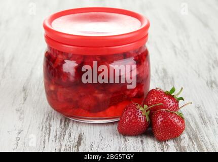Home made berry jam on wooden table Stock Photo - Alamy