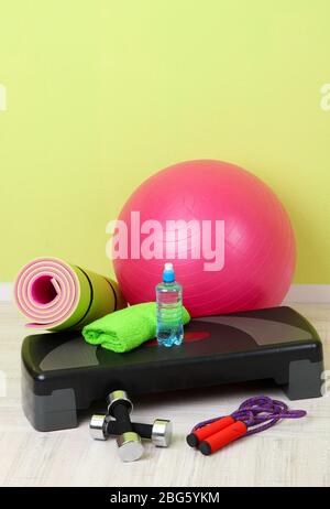 Different tools for fitness in room Stock Photo - Alamy