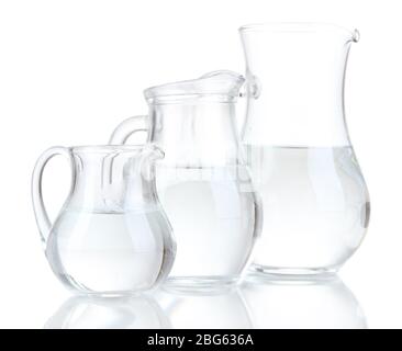 Glass pitchers of water isolated on white Stock Photo - Alamy