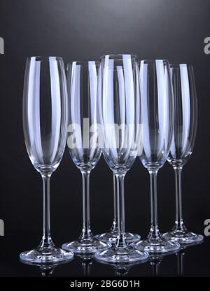 Empty glasses on grey background Stock Photo - Alamy